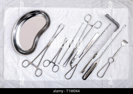 Gynecological sterile tools. A lot of instruments of gynecologist on ...