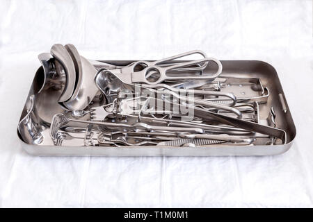 Gynecological sterile tools. A lot of instruments of gynecologist on ...