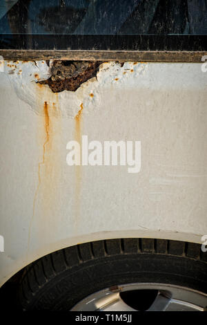 Junk car bodywork suffering heavy rust Stock Photo - Alamy