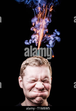A vertical shot of exploding fireworks over the National WWI Memorial ...