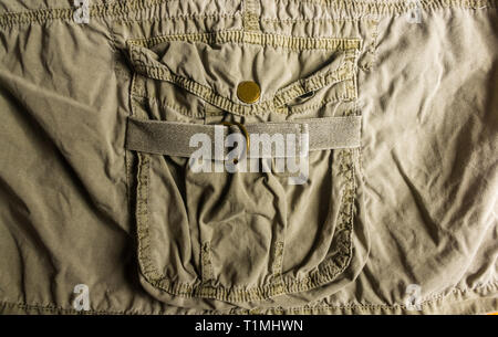 clothing items washed cotton fabric texture with seams, clasps, buttons ...