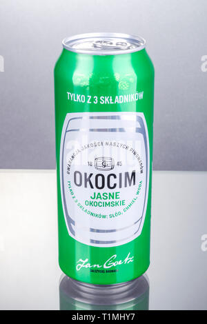Can of Okocim beer isolated on gradient background Stock Photo - Alamy