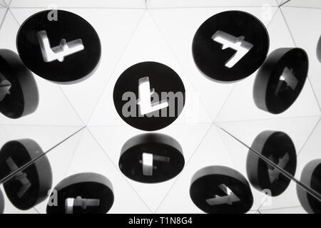 Litecoin Currency Symbol With Many Mirroring Images of Itself on Blue ...