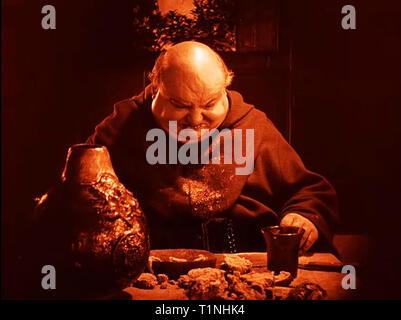 Happy fat monk at meal time Stock Photo - Alamy
