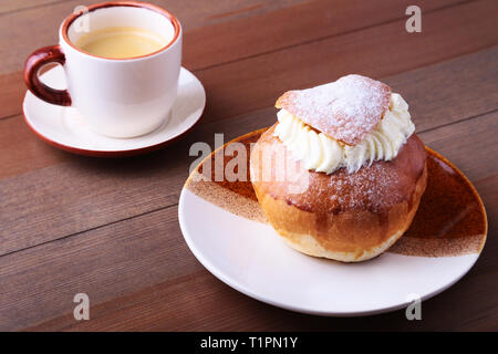 Traditional swedish dessert Semla, also called Shrove bun, with almond ...