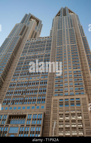 a low angle shot of Tokyo Metropolitan Government Building in Japan ...
