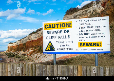 Signpost warning of coastal erosion at Hunstanton cliffs, North North ...