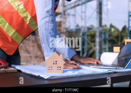 engineer planing and working on table in construction working site ...