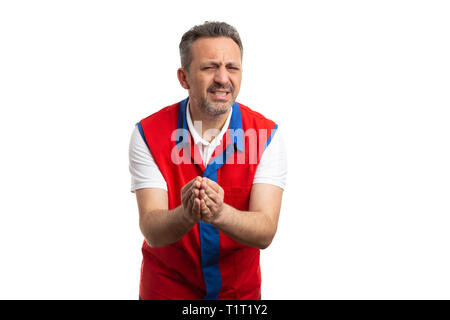 Man imploring with hands together Stock Photo - Alamy