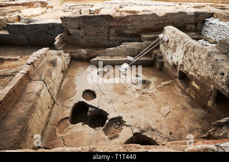 Building 321. Empty burial pit in the floor of the Neolithic remains of ...