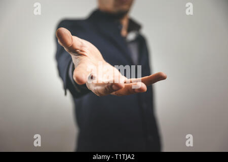 Call me the hand gesture of a man. Male showing little and thumb Stock ...