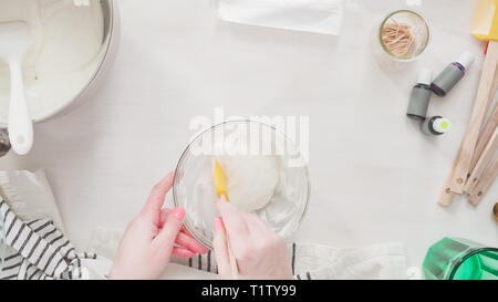 Step by step. Flat lay. Mixing royal icing in electric kitchen mixer ...