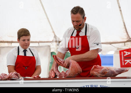 The Food Heroes marquee runs a butchery demonstration at the 2018 ...