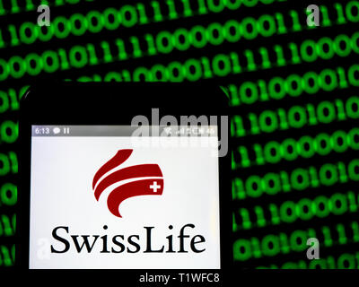 In this photo illustration a Swiss Life Group logo seen displayed on a ...