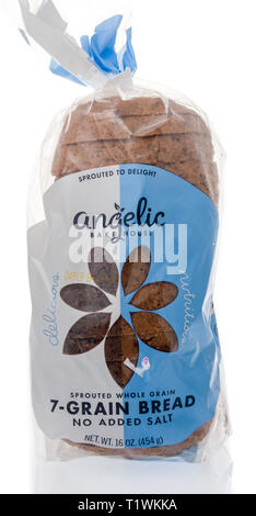 Sliced sprouted grain bread isolated on a white background. Bread ...