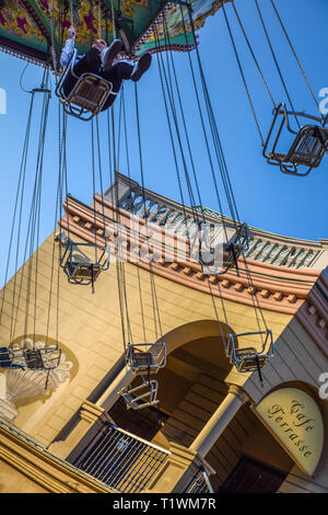 Fun fair swing ride spinning Stock Photo - Alamy