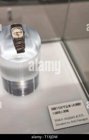 A watch that has stopped at 8:15, the time the A bomb exploded, on ...