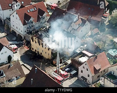 29 March 2019, Baden-Wuerttemberg, Stuttgart: A man drives on the ...