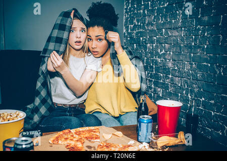 Picture of scared girls women friends sisters isolated over pink wall ...