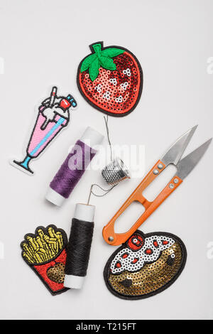 Cocktail fabric patch on white Stock Photo - Alamy