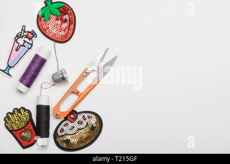 Cocktail fabric patch on white Stock Photo - Alamy