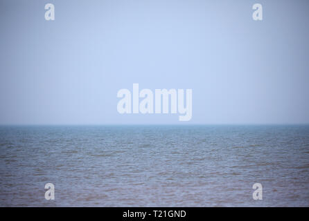 Heacham, UK. 29th Mar, 2019. Birds are silhouetted against a beautiful ...