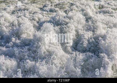 Stern wave, stern water, wake of a motor boat, turbulence of water ...