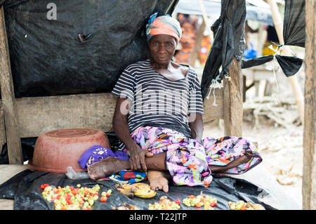 Adzopé , côte d'ivoire - June 10, 2017: a teenager on a motorcycle taxi ...