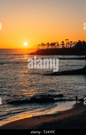 Sunset over the beach at Heisler Park, in Laguna Beach, Orange County ...