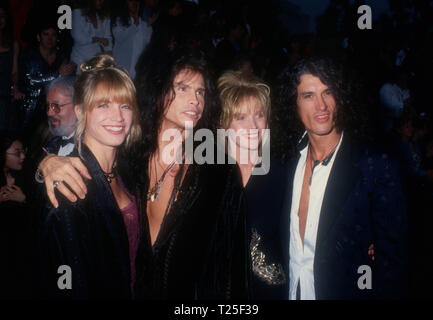 Steven Tyler with wife Teresa Barrick and her twin sister Lisa Barrick ...