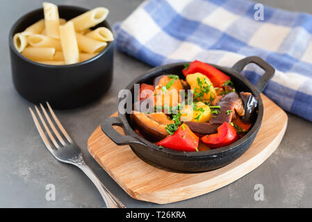 Vegetarian letcho with baked aubergine, zucchini, pepper in tomato ...