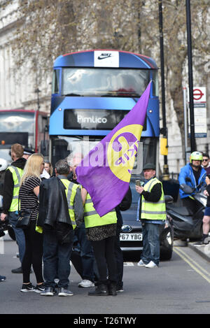 Westminster, London, UK. 30th Mar 2021. People work on the National ...