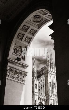 Milan Cathedral viewed through archway in Italy Stock Photo - Alamy