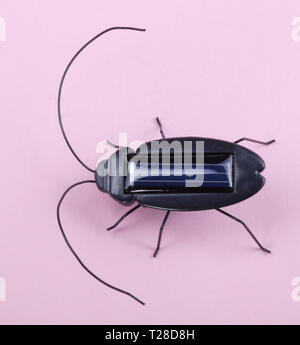 Electronic Bug Toy on Pink Background Stock Photo - Alamy