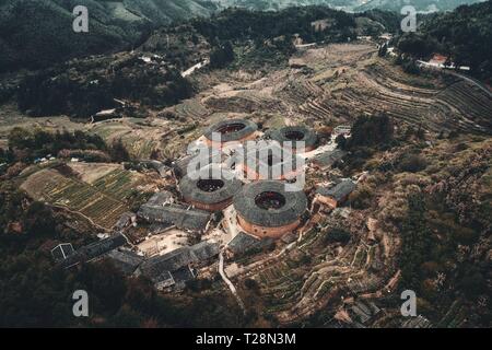 Aerial view of Tulou, the unique dwellings of Hakka in Fujian, China ...
