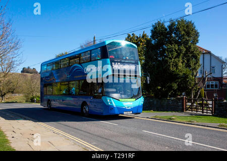 A Yorkshire Coastliner double decker bus picking up passengers outside ...