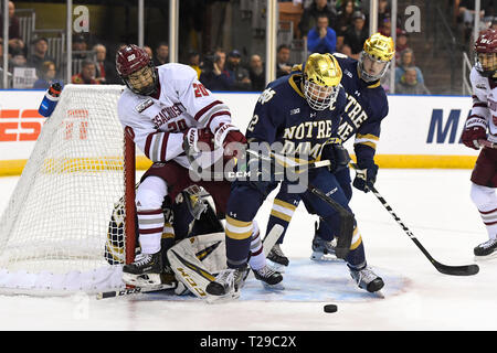 Massachusett's Oliver Chau (20) during an NCAA hockey game against ...