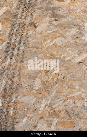 Detail of load bearing OSB / Oriented Strand Board panel on a building ...