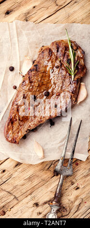 Grilled ribeye beef steak with herbs and spices. Flat lay Stock Photo ...