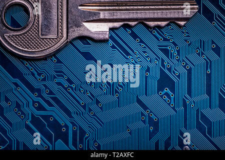 Background image of key on a microchip Stock Photo - Alamy