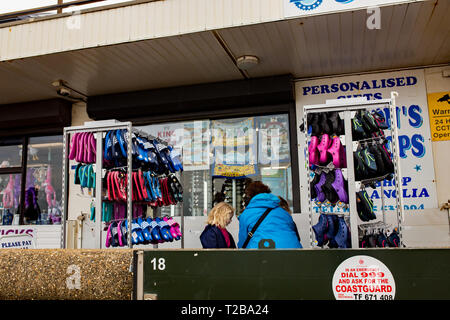 Hunstanton, England. 23 March 2019. The lady in bakery checking on the ...