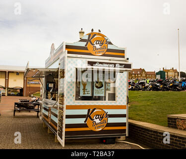 Hunstanton, England. 23 March 2019. The lady in bakery checking on the ...