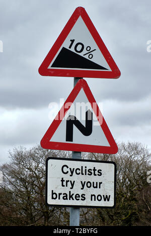 Red Triangle warning sign for cyclists- steep slope slow down Stock ...