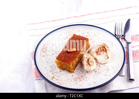 Traditional Turkish dessert - sambali, sambaba or damascus with cream ...
