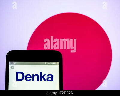 In this photo illustration a Denka Company Limited logo seen displayed ...