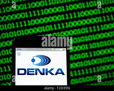 In this photo illustration a Denka Company Limited logo seen displayed ...