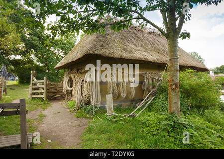 Replica traditional wood and thatch house of Orang Ulu tribe, Sarawak ...