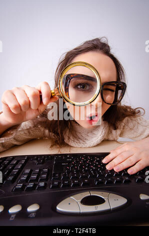 Funny nerd girl working on computer Stock Photo - Alamy