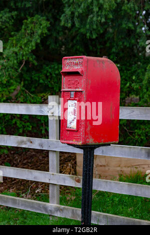 Traditional British GPO cast iron red telephone box, disused and ...
