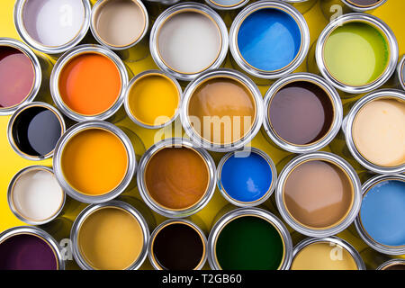 Paint cans color palette, yellow background Stock Photo - Alamy